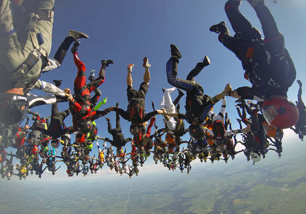 164 men break record for largest ever vertical skydiving | World News ...