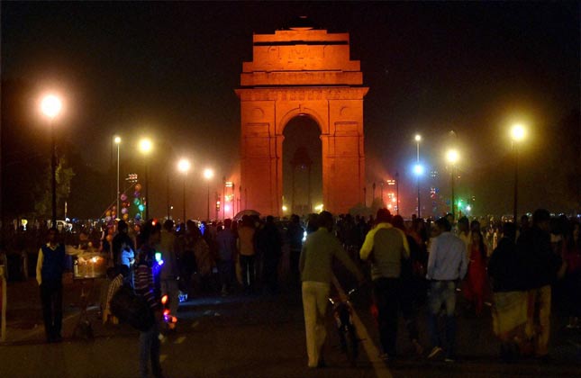 In pics: India Gate turns orange for ending violence against women ...